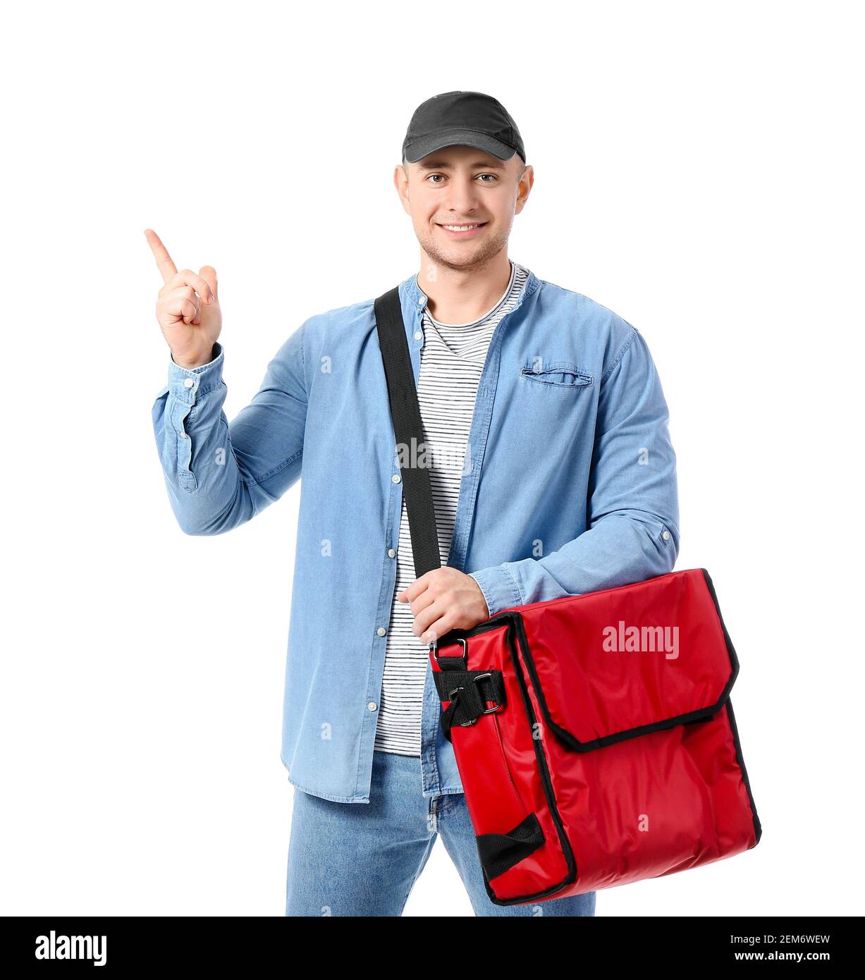 Courier of food delivery service pointing at something on white ...