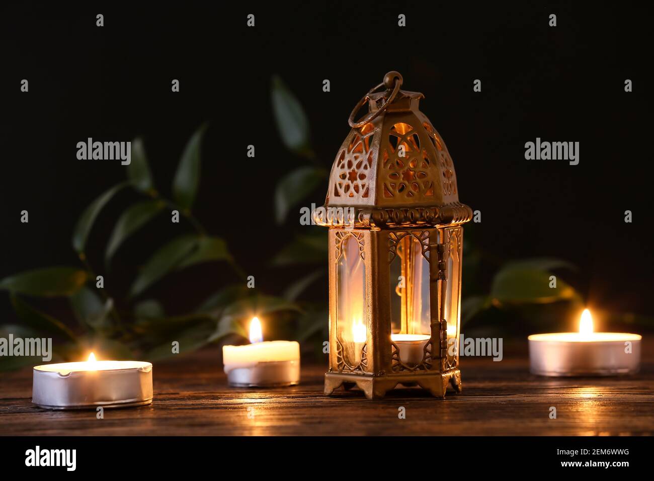 Muslim lamp and candles on dark background Stock Photo - Alamy