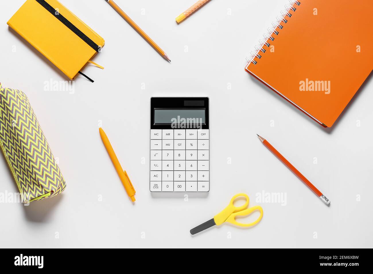 Modern calculator and stationery on white background Stock Photo - Alamy