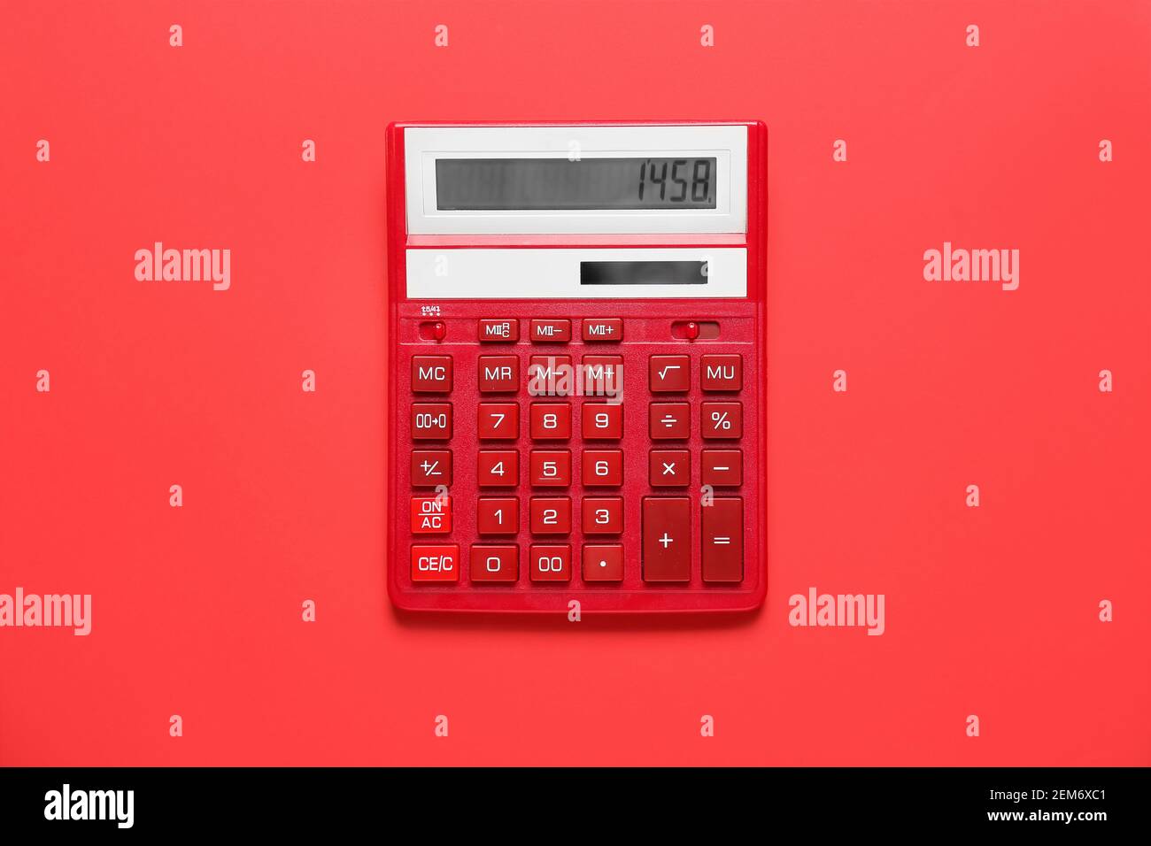 Modern calculator on color background Stock Photo - Alamy