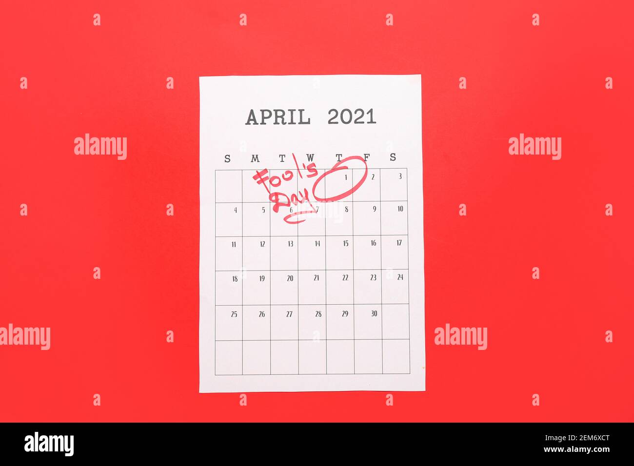 Calendar with marked date of April Fool's Day on color background Stock ...