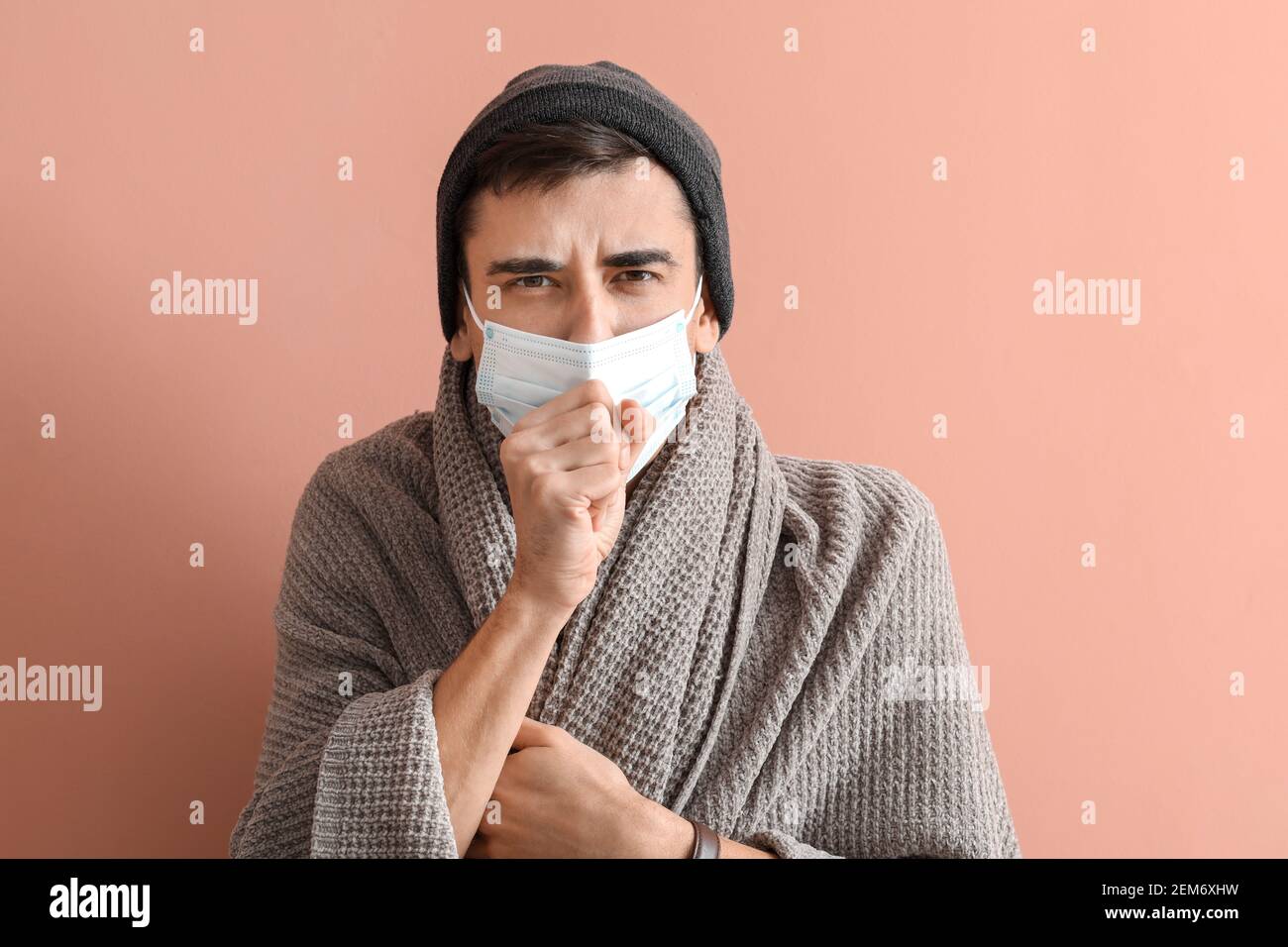 Sick man on color background Stock Photo - Alamy