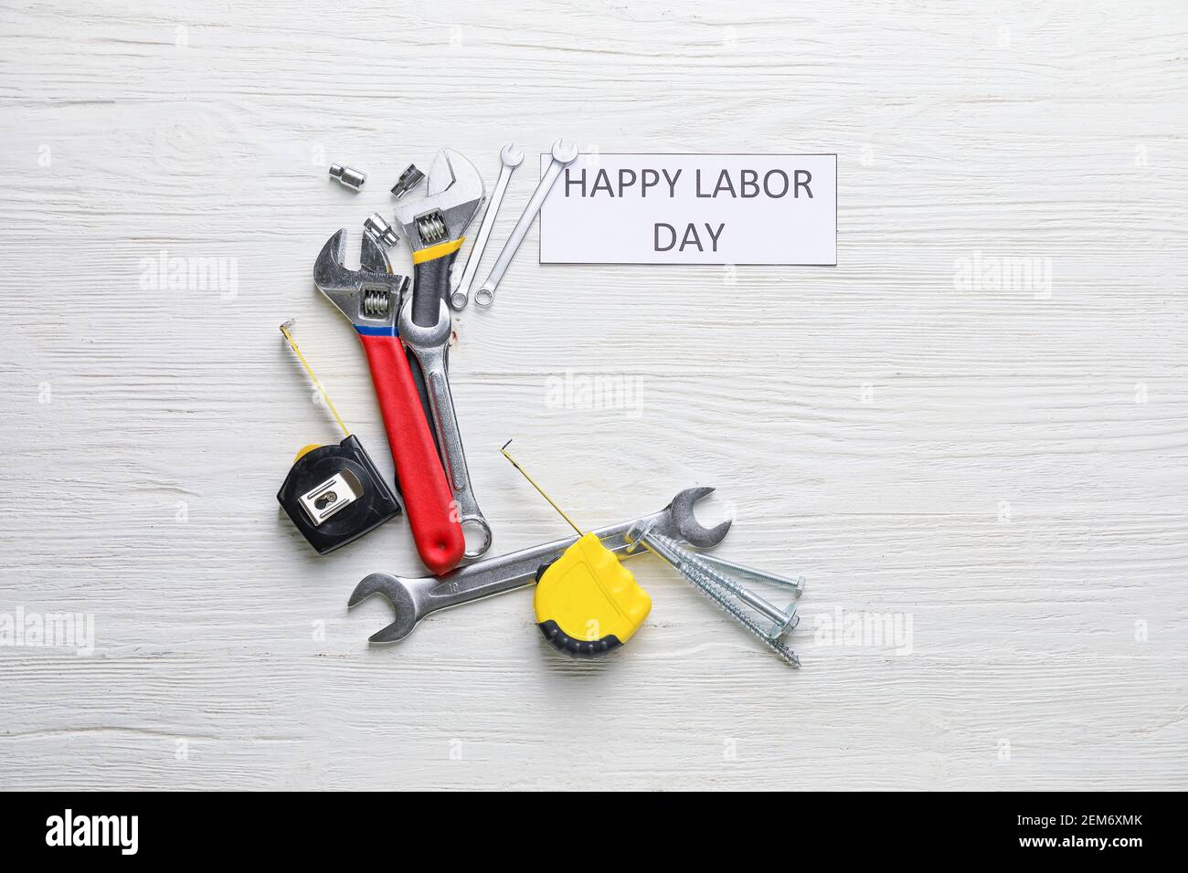 Set of tools on white wooden background. Labor Day celebration Stock ...
