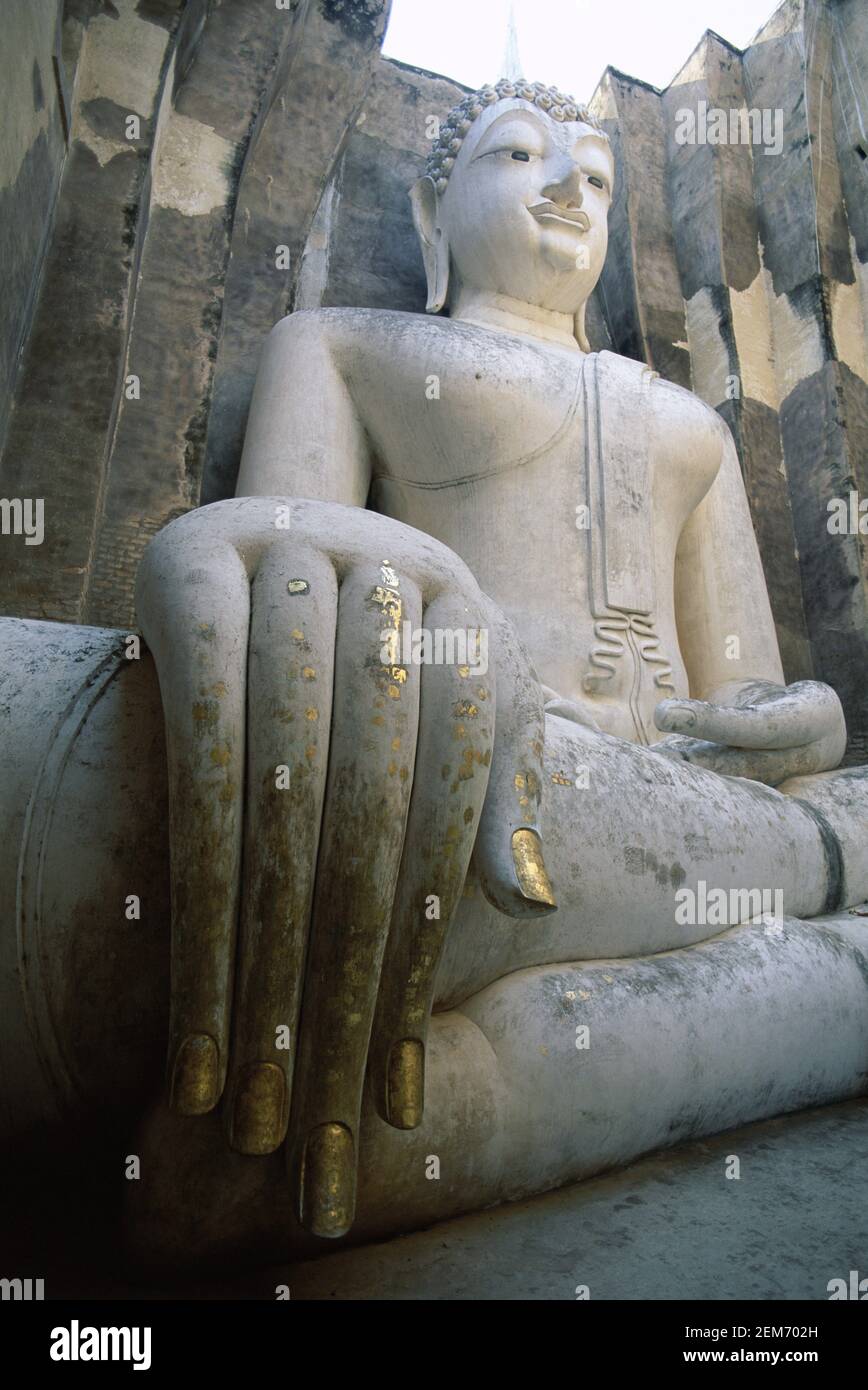 Asia,Thailand, Sukhothai, Wat Si Chum Buddhist temple,hand and fingers ...