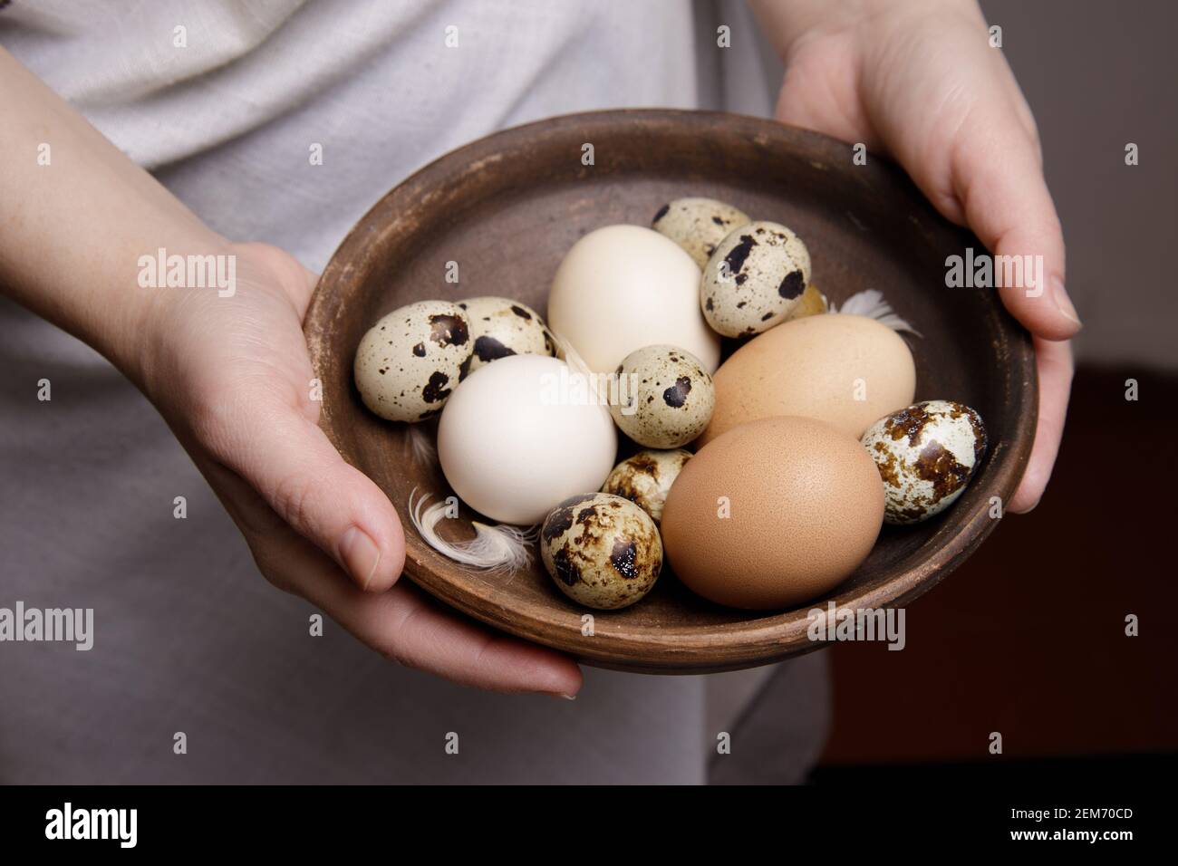Hands holding eggs farmer hi-res stock photography and images - Alamy