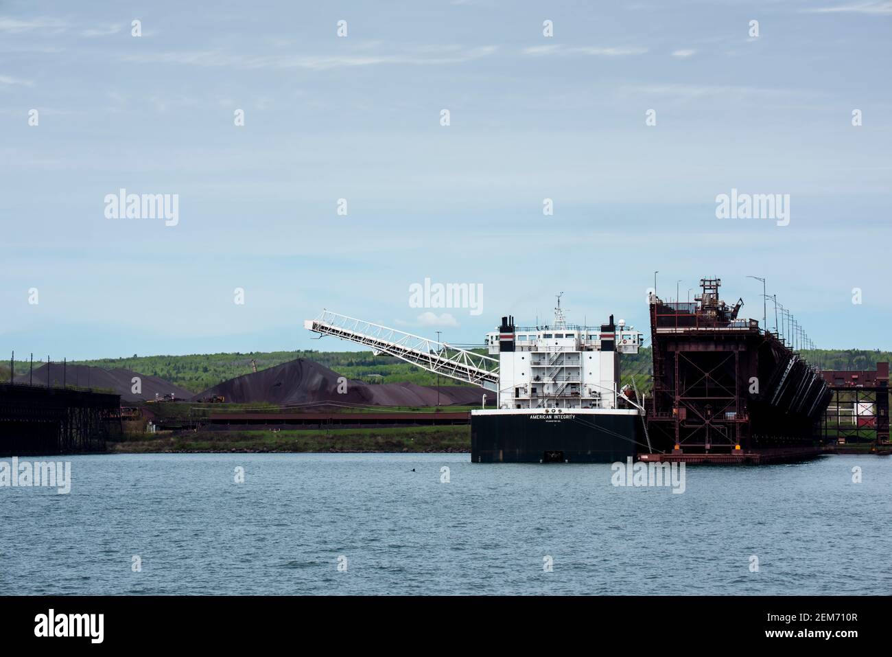 Two harbors, Minnesota. A freighter is picking up a load of iron ore ...