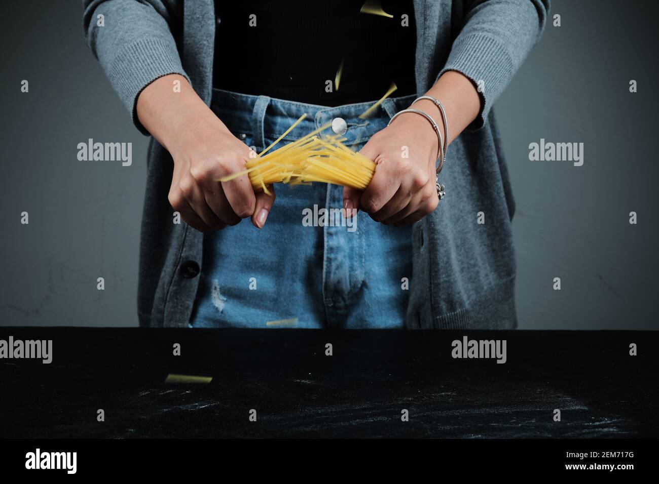 Breaking spaghetti hi-res stock photography and images - Alamy