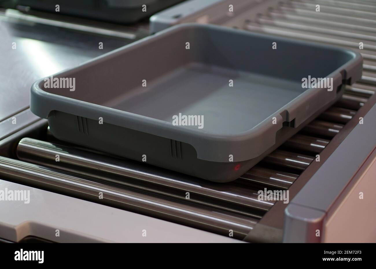 Close-up view of Plastic tray to keep things of X-Ray security ...