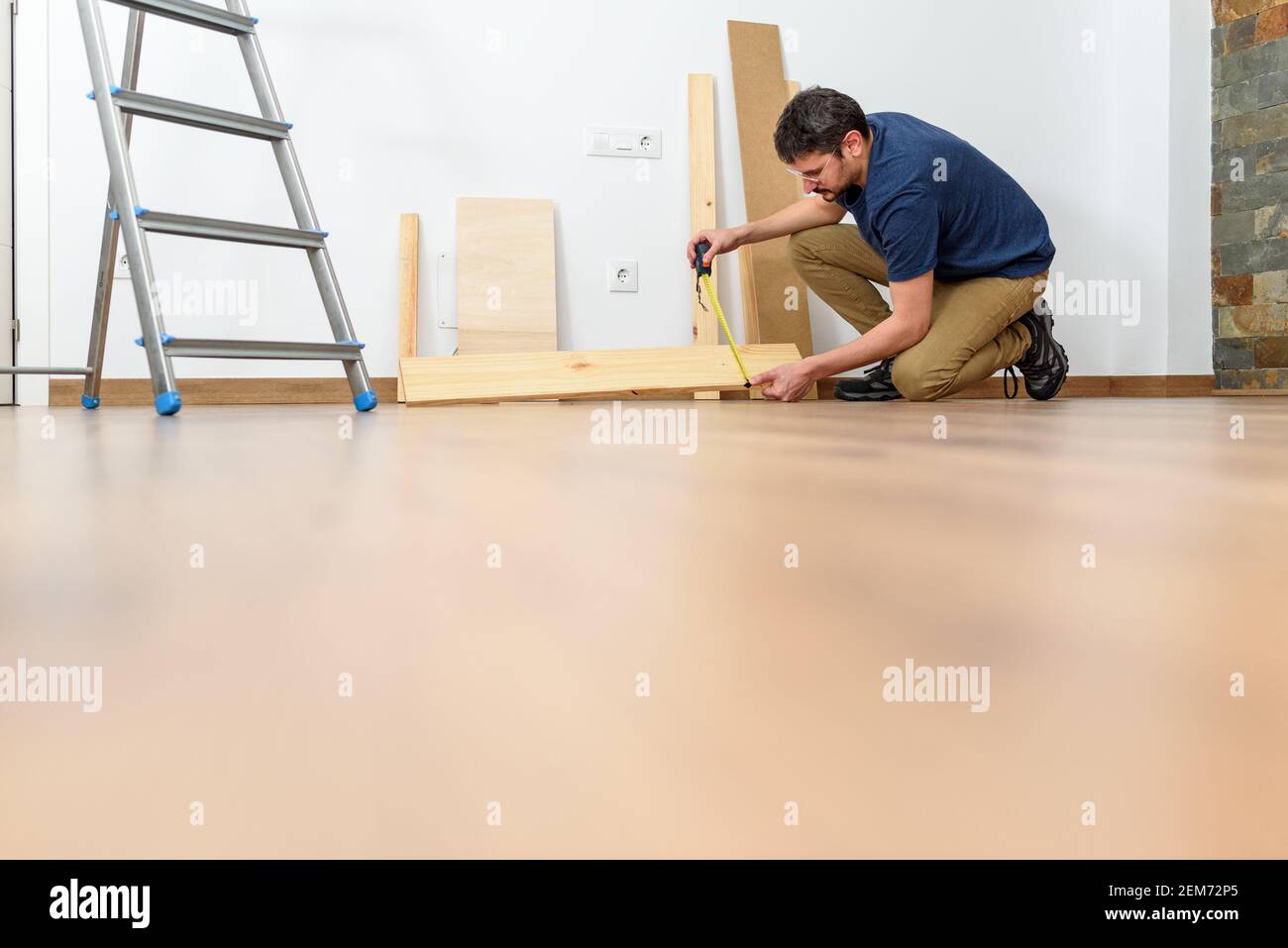 Man doing diy hi-res stock photography and images - Alamy