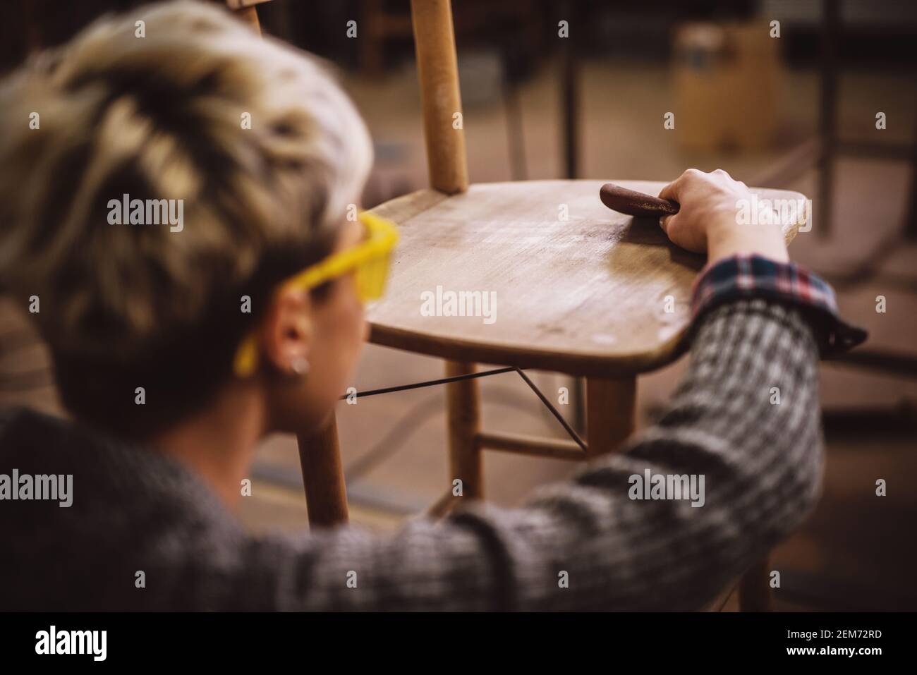 Female wooden chair making hi-res stock photography and images - Alamy