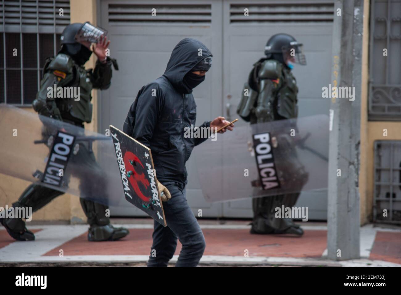 Demonstrators protest with posters and signs against the police and the ...