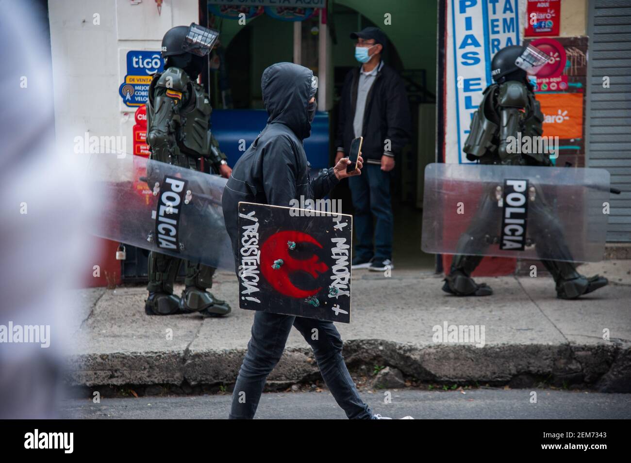 Demonstrators protest with posters and signs against the police and the ...