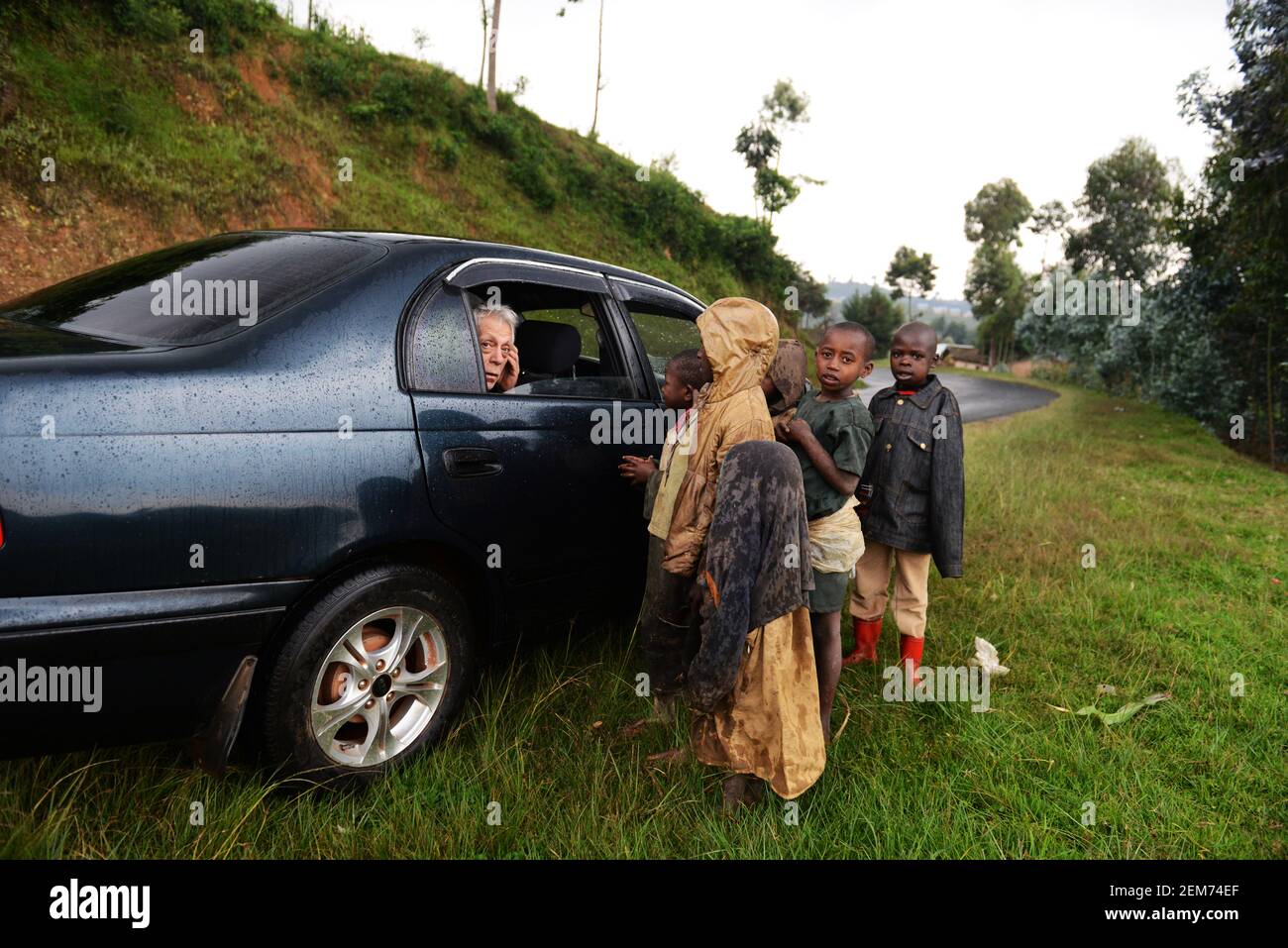 Rwandan children curious in meeting a European foreigner Stock Photo ...