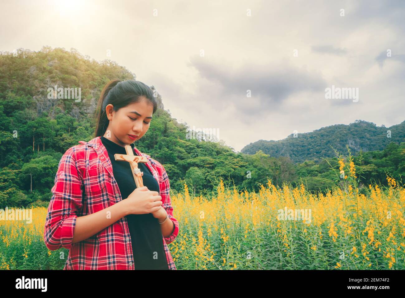 Young sad christian woman praying hi-res stock photography and images ...