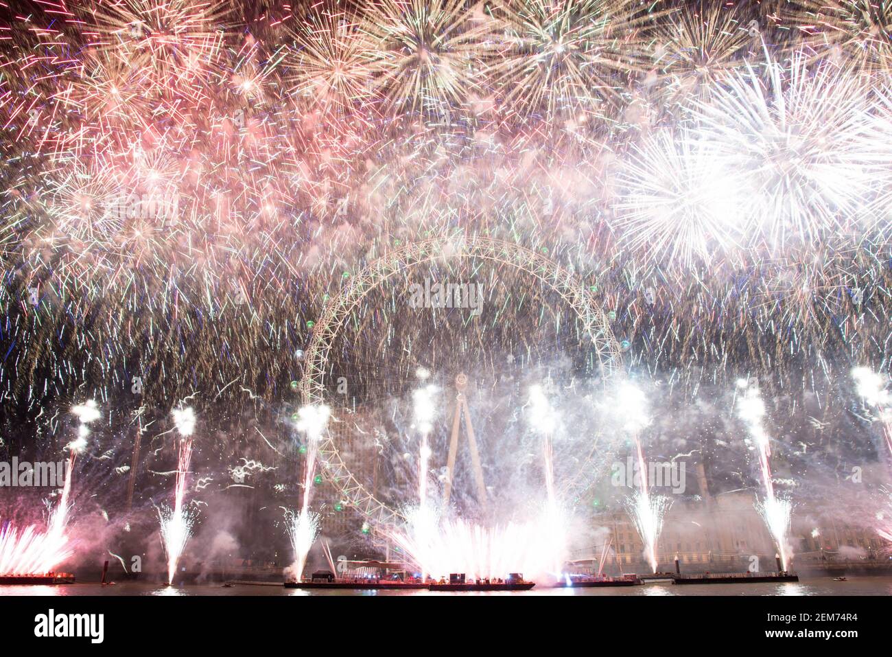 Fireworks light up the night sky over the Coca Cola London Eye in ...