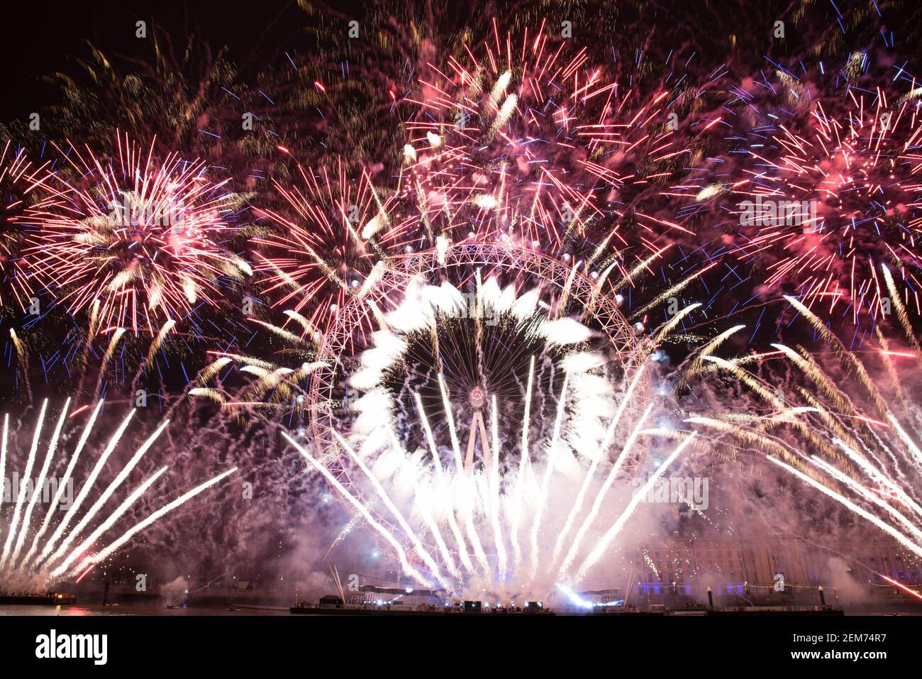 Fireworks light up the night sky over the Coca Cola London Eye in ...