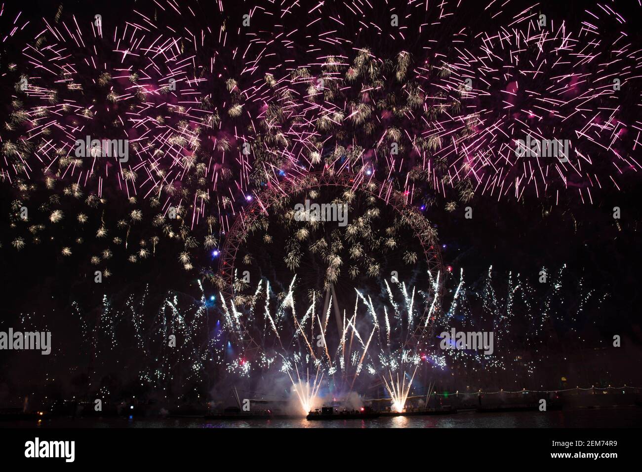 Fireworks light up the night sky over the Coca Cola London Eye in ...
