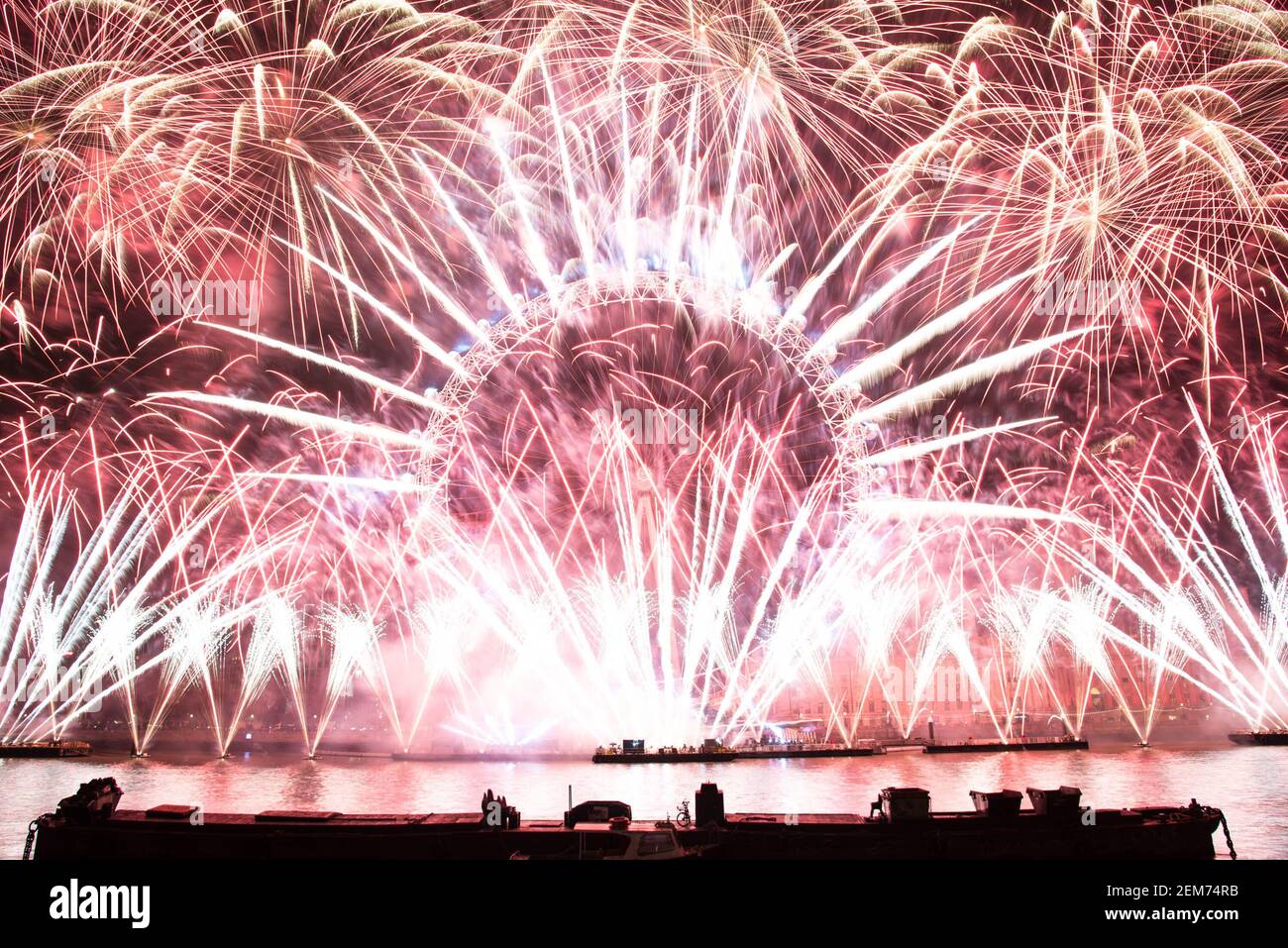 Fireworks light up the night sky over the Coca Cola London Eye in ...