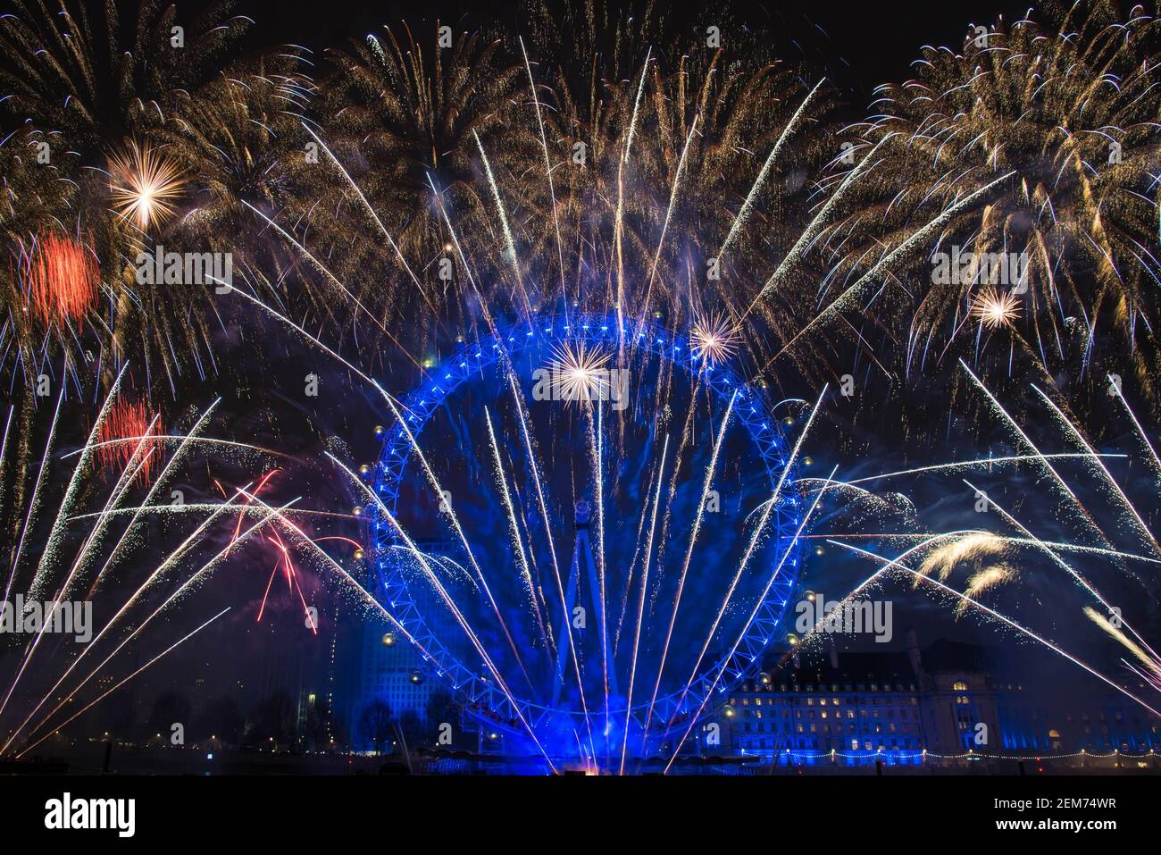Fireworks light up the night sky over the Coca Cola London Eye in ...