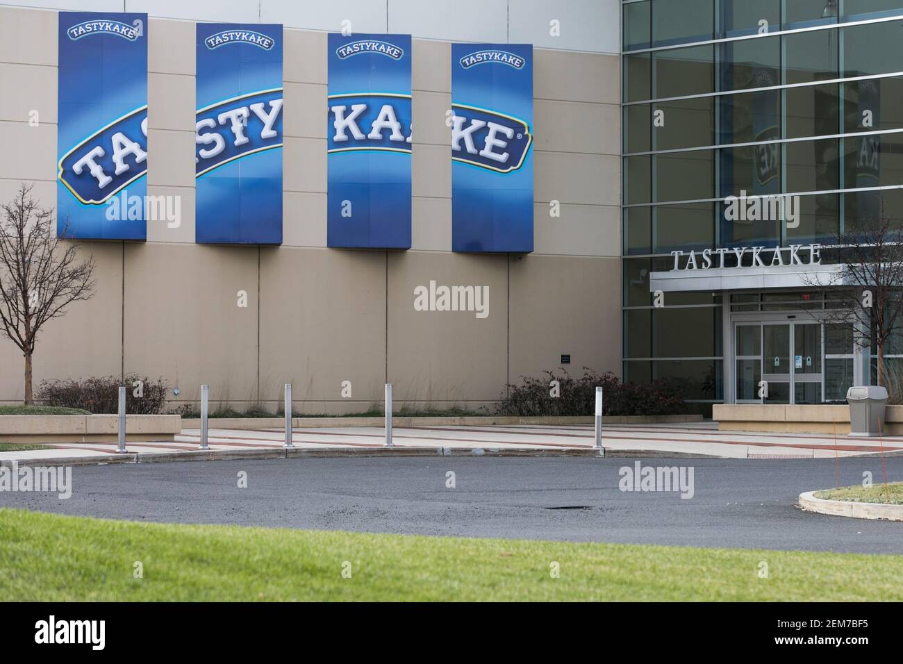 A logo sign outside of the headquarters of the Tasty Baking Company ...