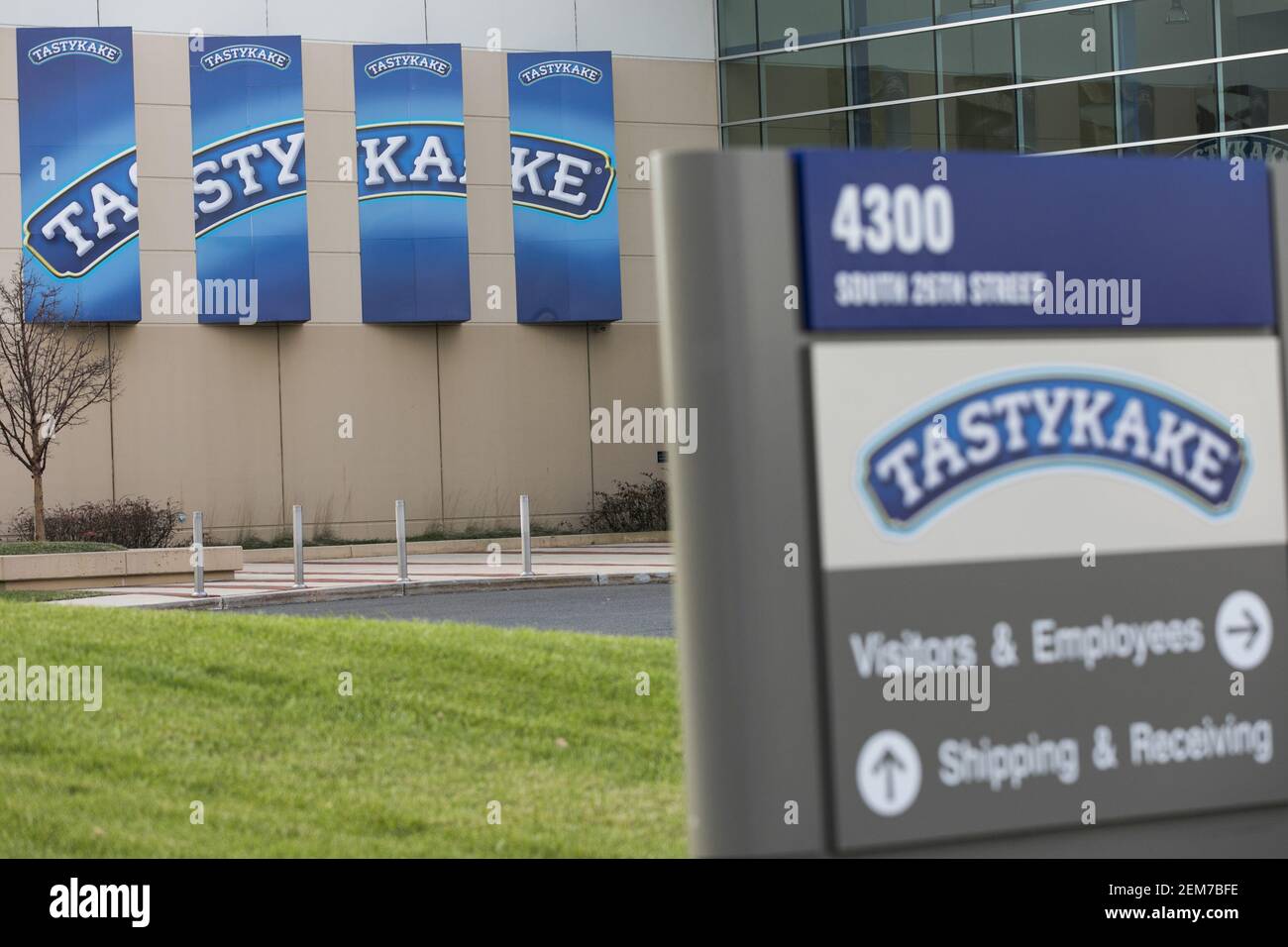 A logo sign outside of the headquarters of the Tasty Baking Company ...