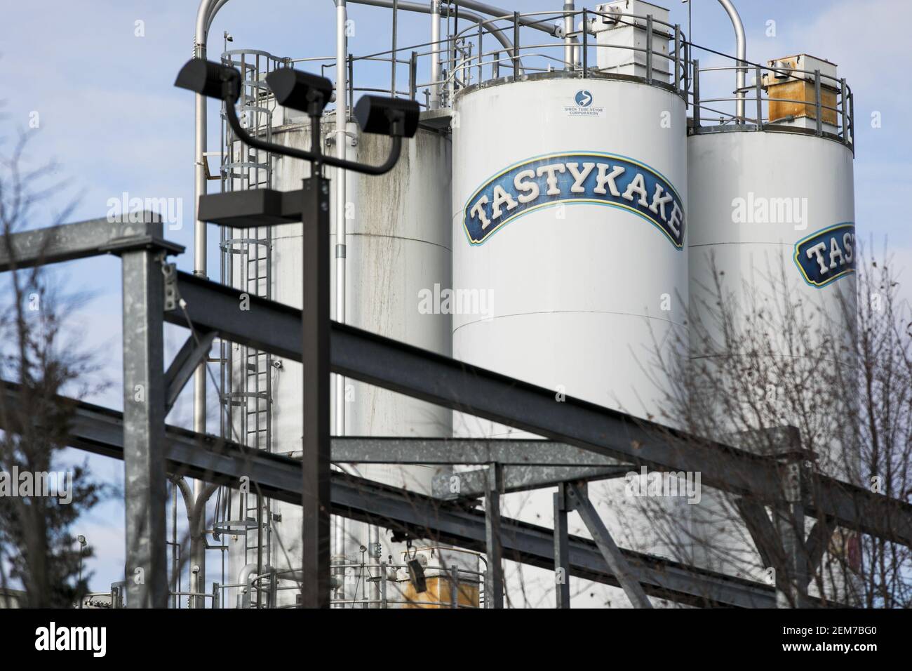 A logo sign outside of the headquarters of the Tasty Baking Company ...