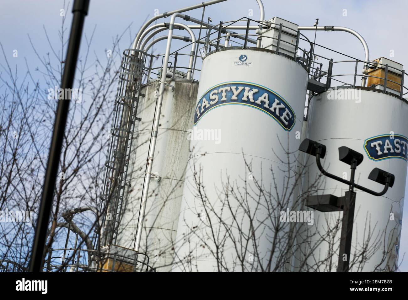 A logo sign outside of the headquarters of the Tasty Baking Company ...