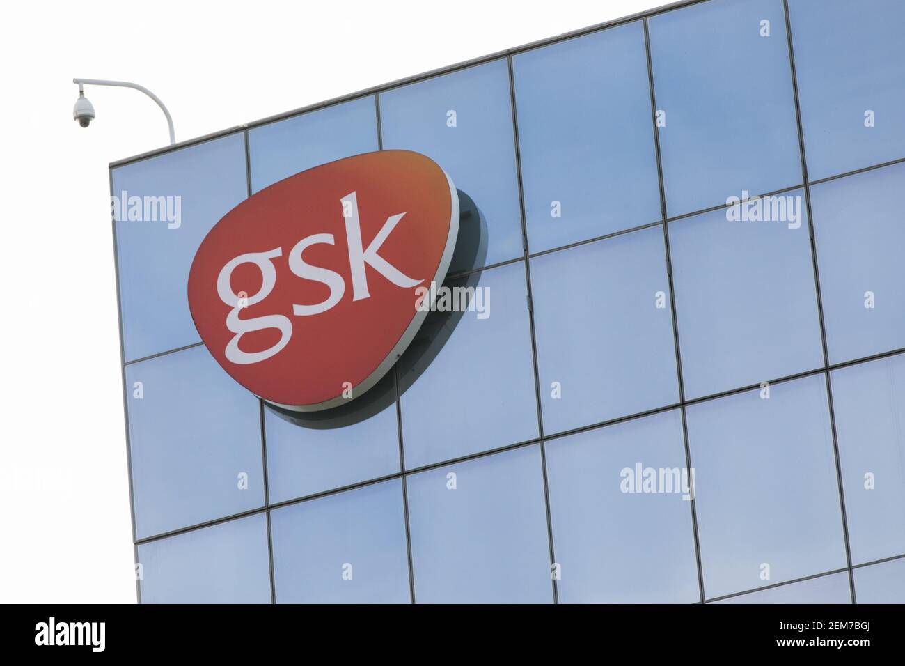 A logo sign outside of a facility occupied by GlaxoSmithKline (GSK) in ...