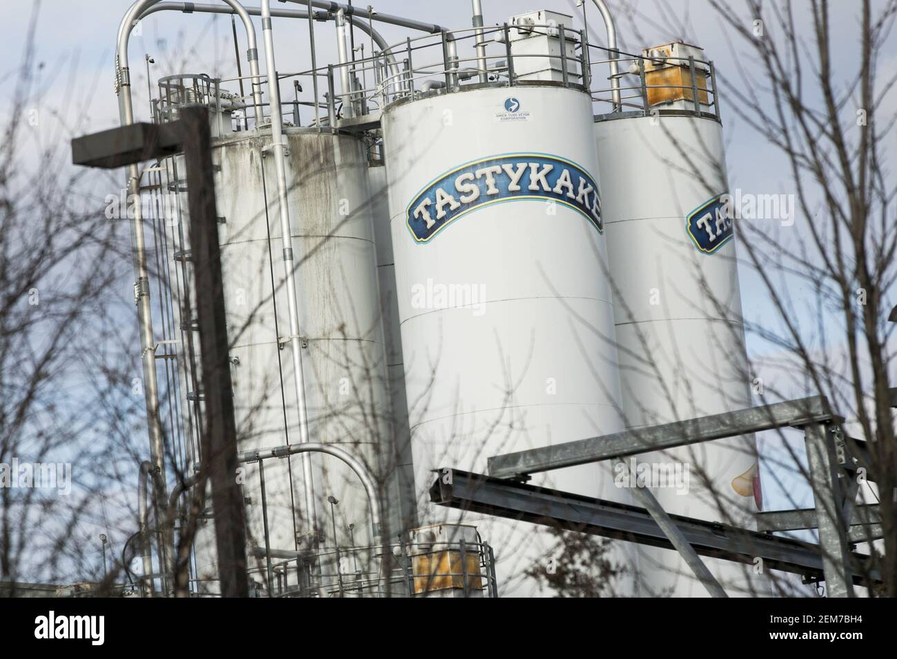 A logo sign outside of the headquarters of the Tasty Baking Company ...