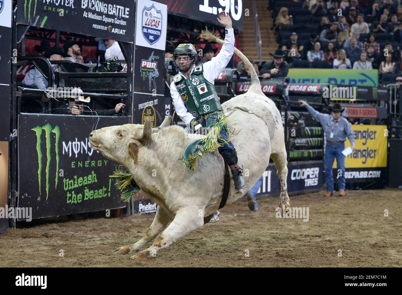 Professional bull rider Cooper Davis from Texas rides a bull named ...