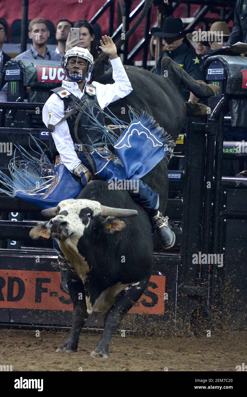 Professional bull rider Ezekiel Mitchell from Texas rides The Punisher ...