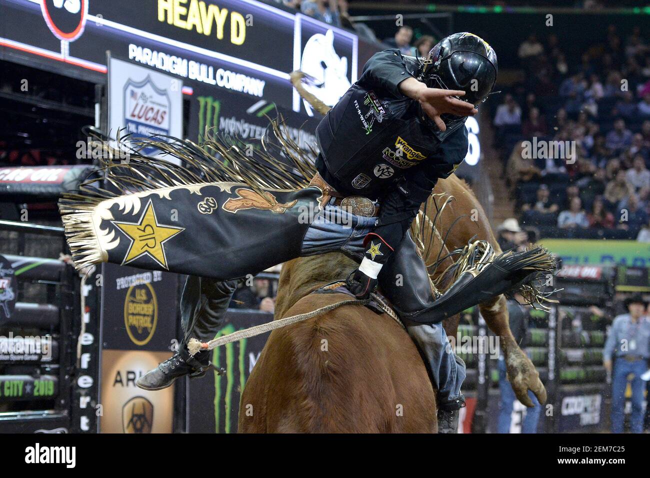 Professional bull rider Cody Jesus from Arizona rides a bull named ...