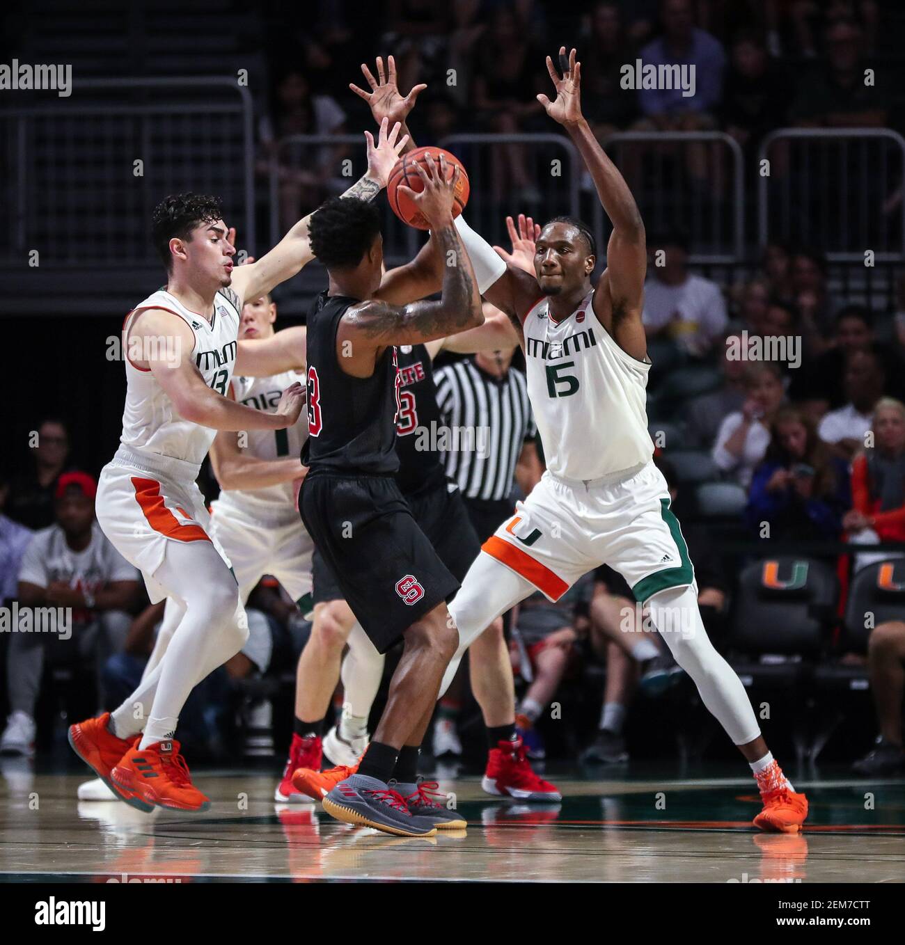 January 03, 2019: Miami Hurricanes center Ebuka Izundu (15) and guard ...