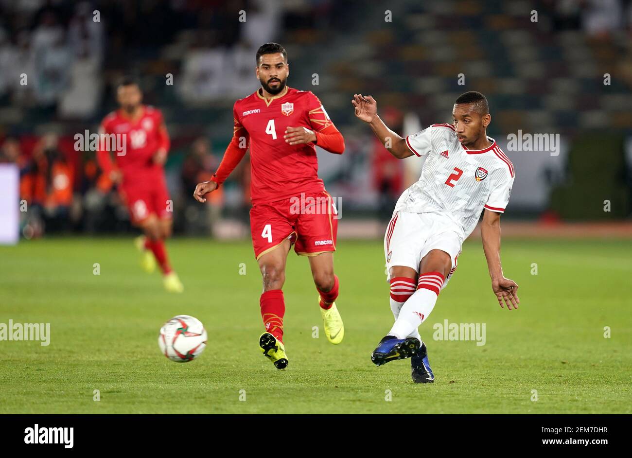 Ali Salmeen of United Arab Emirates passing the ball in front of Sayed ...