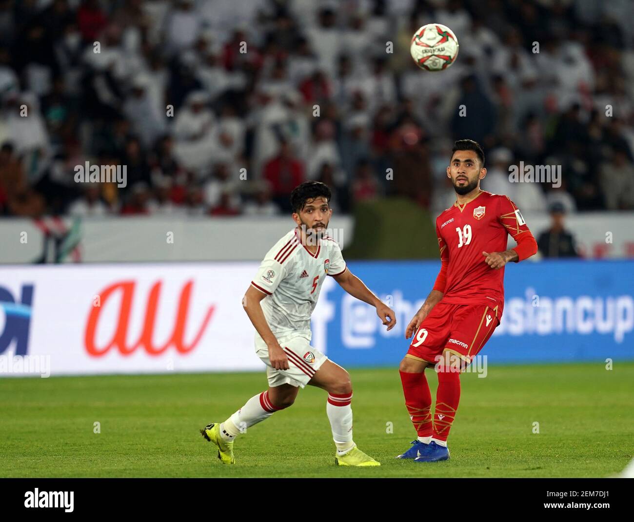 Komail Al Aswad of Bahrain passing the ball in front of Amer ...