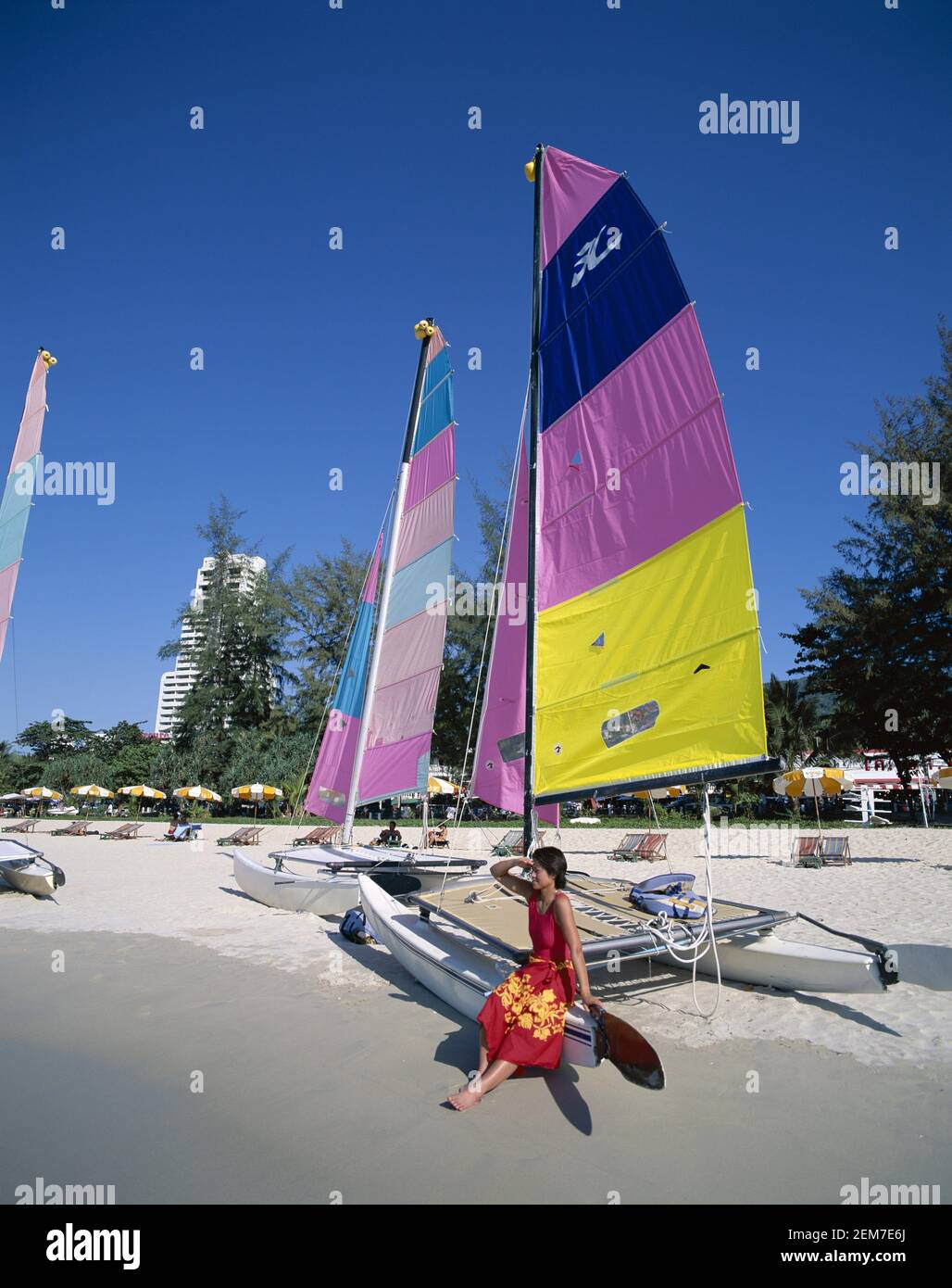 Asia,Thailand, Phuket Island, colourful outrigger canoes and tourists ...