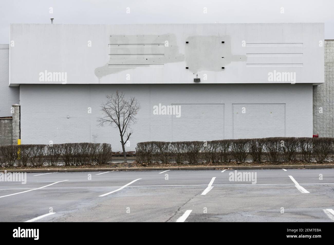 The outline of a logo sign outside of an abandoned Big Kmart retail ...