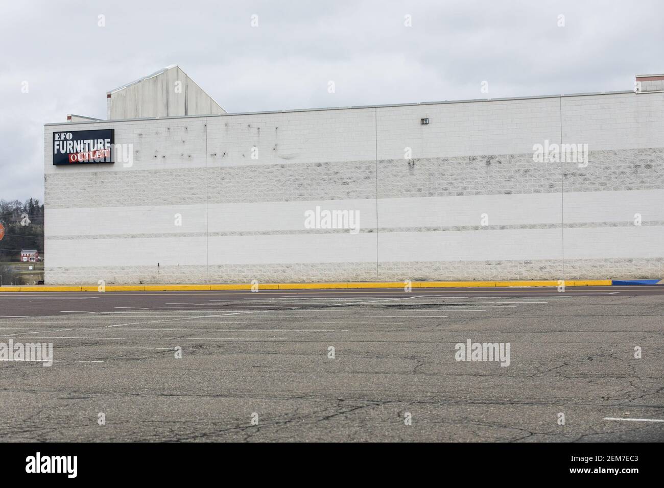 The outline of a logo sign at a closed Sears retail store in Bloomsburg ...
