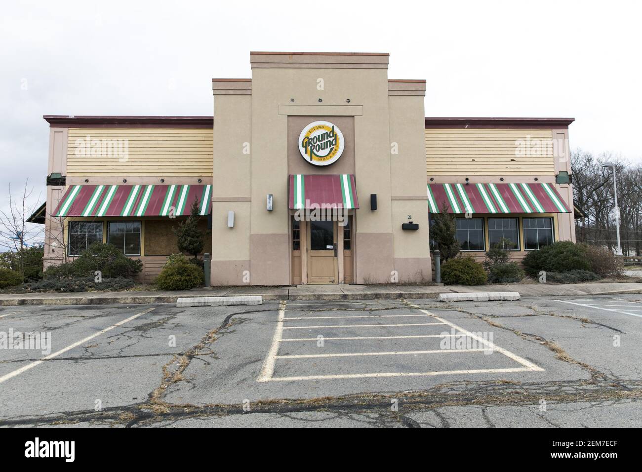 A logo sign outside of an abandoned Ground Round restaurant in Hazleton ...