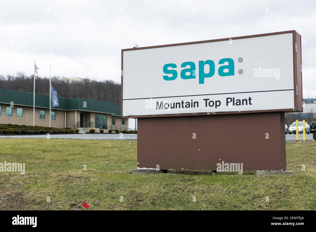 A logo sign outside of a facility occupied by Sapa Extrusions in ...
