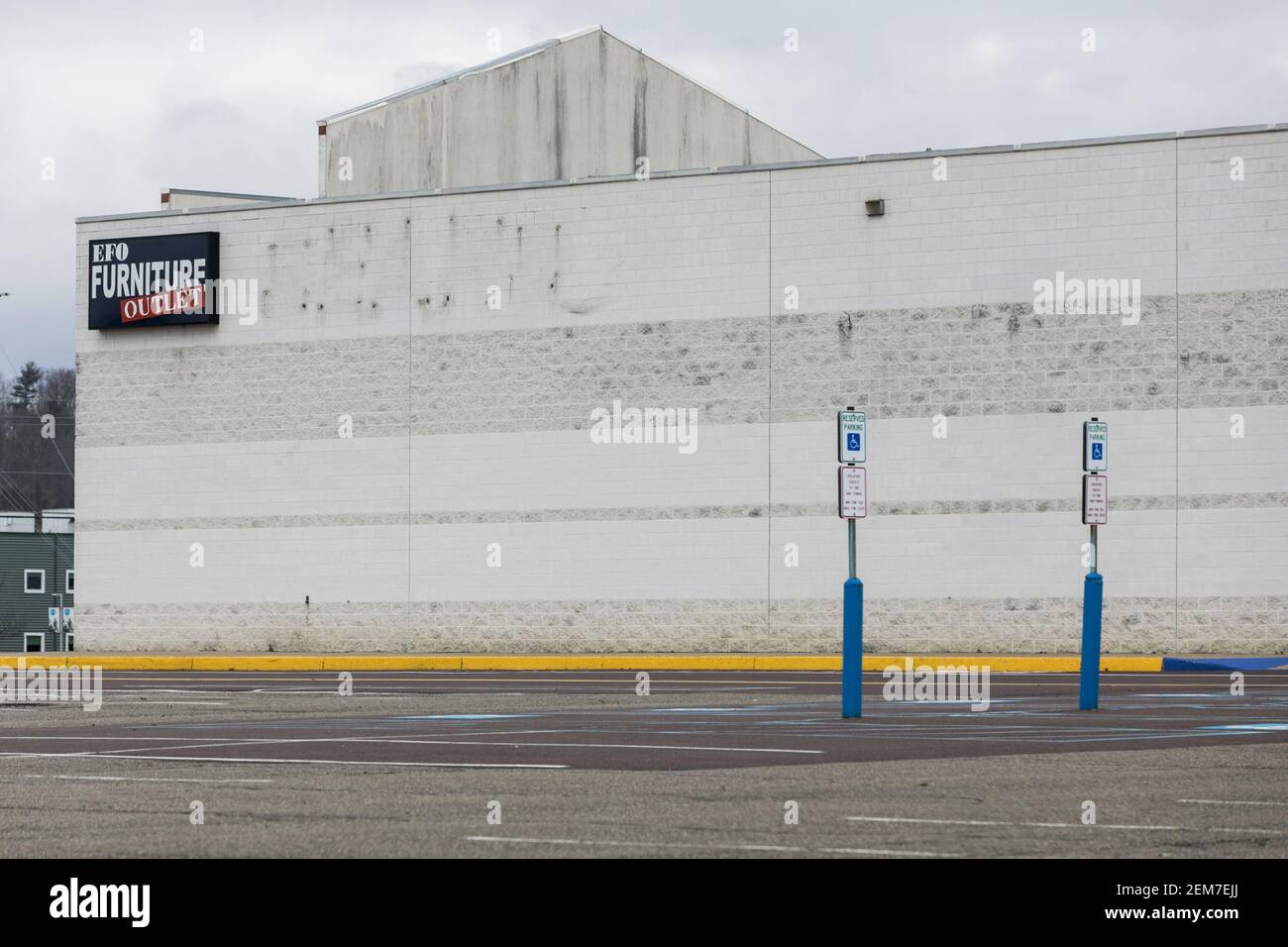 The outline of a logo sign at a closed Sears retail store in Bloomsburg ...