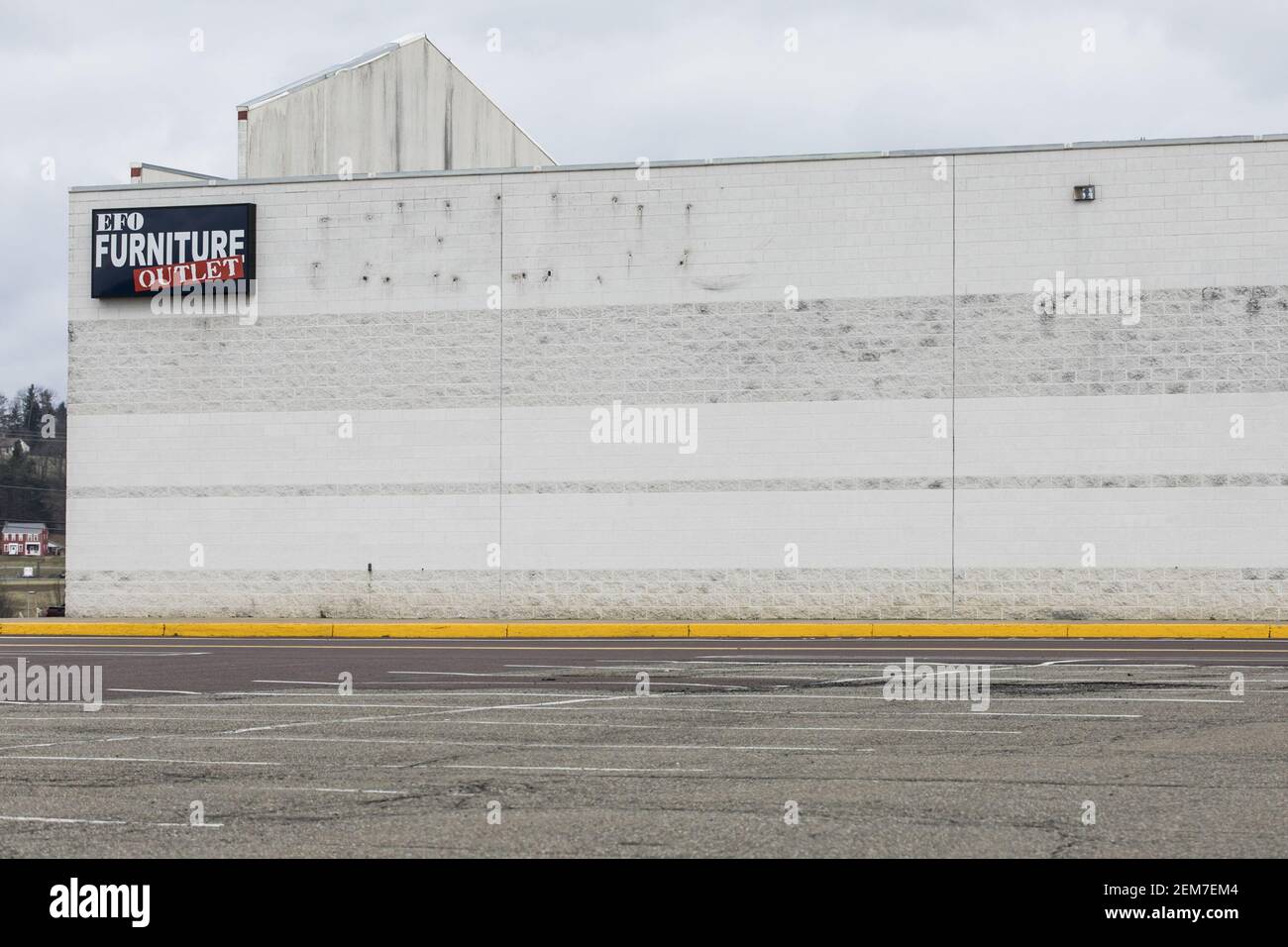 The outline of a logo sign at a closed Sears retail store in Bloomsburg ...