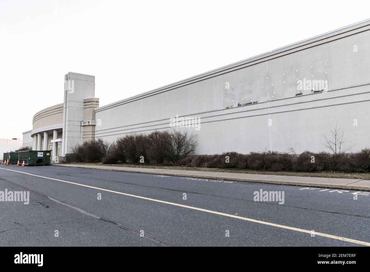 The outline of a logo sign at a closed Sears retail store in ...