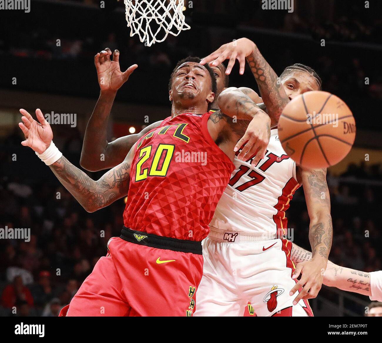Miami Heat guard Rodney McGruder blocks a shot by Atlanta Hawks forward ...