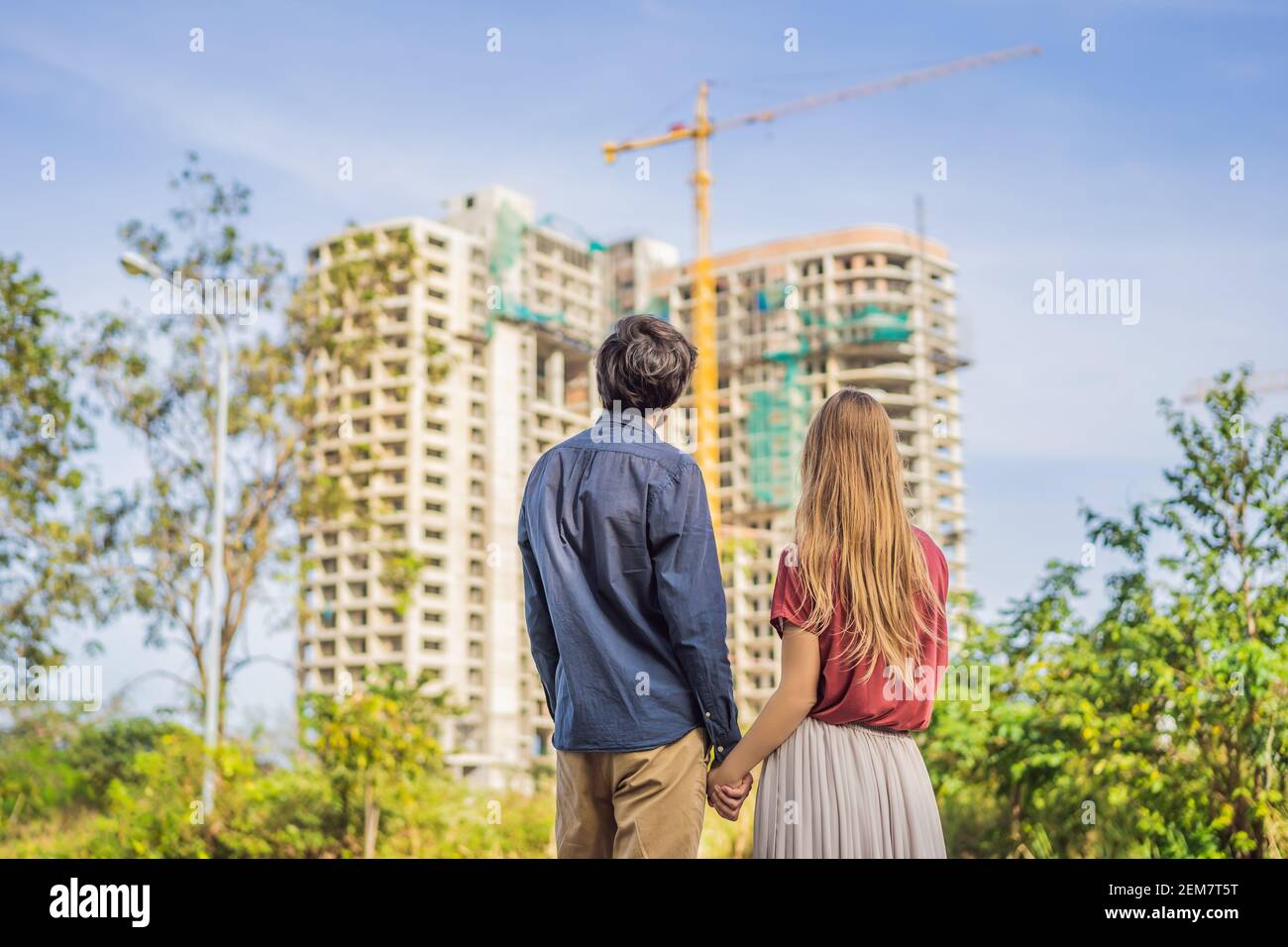 Couple property apartment looking hi-res stock photography and images ...