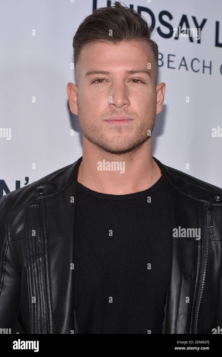 Mike Mulderrig attends "Lindsay Lohan Beach Club" event at the Magic ...