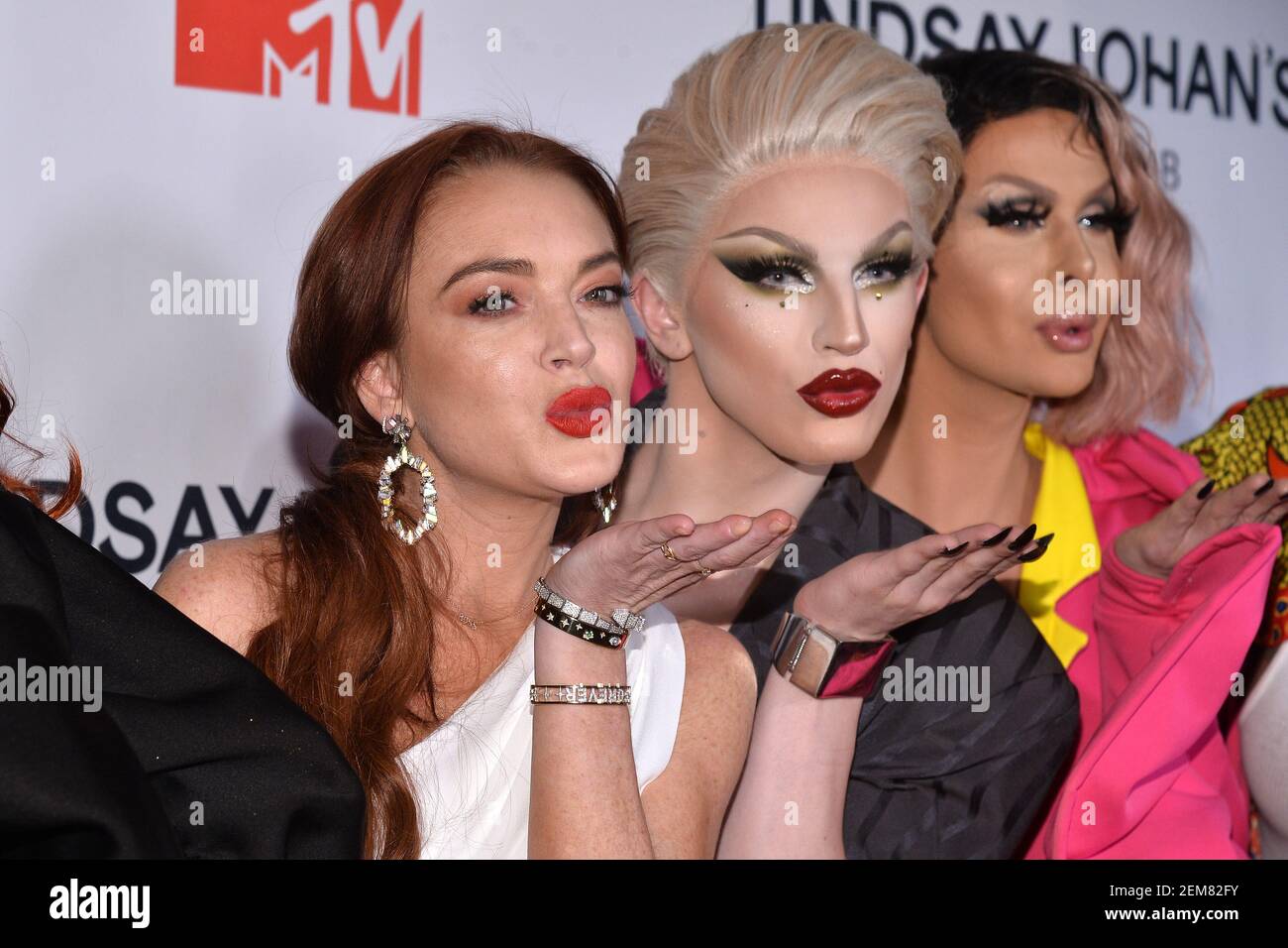 (L-R) Lindsay Lohan, drag queenz Aquaria and Trinity "the Tuck" Taylor ...