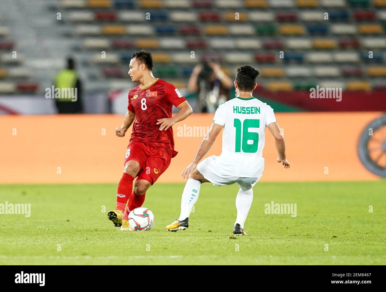 January 8, 2019 : Nguy?n Tr?ng HoË†ng of Vietnammaking a see away pass past Hussein Ali of Iraq ...
