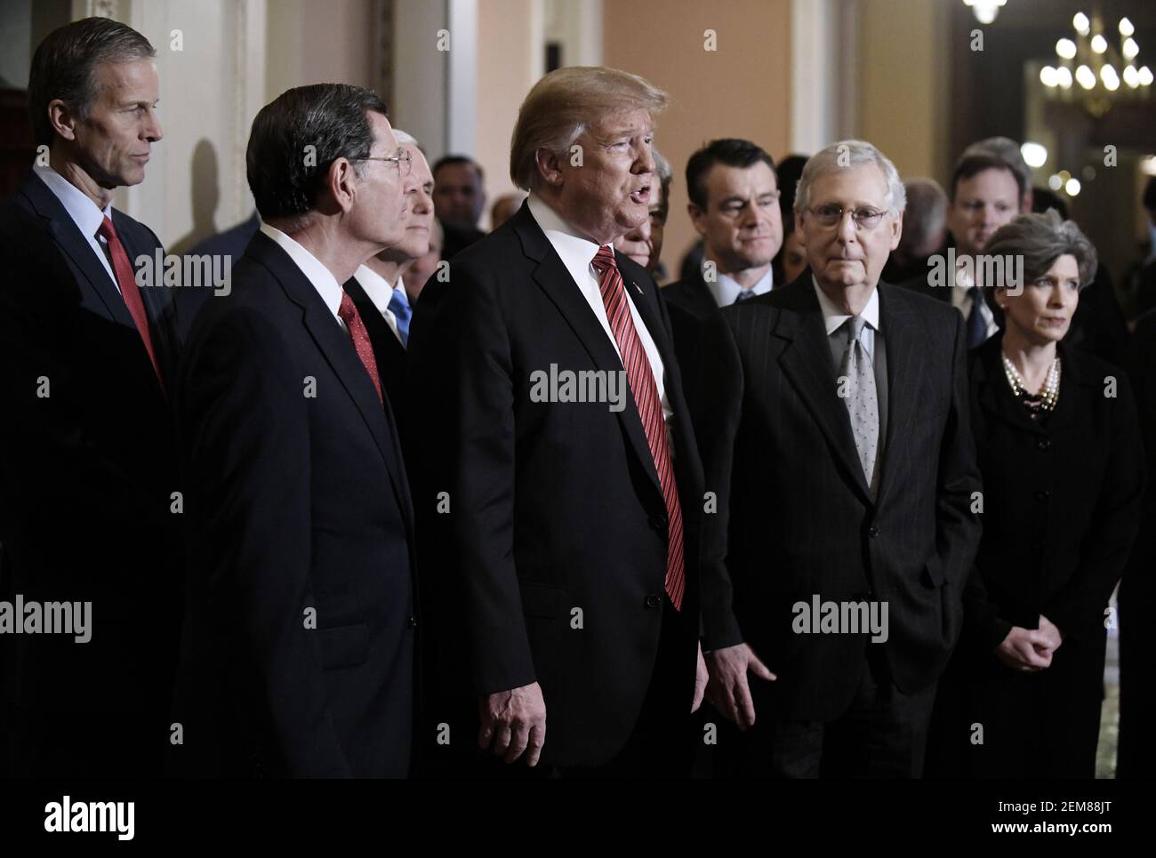 US President Donald Trump talks to the press after the Republican ...