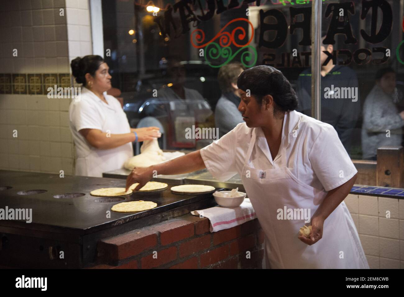 Women make hand made tortillas at the Old Town Mexican Cafe, Old Town ...